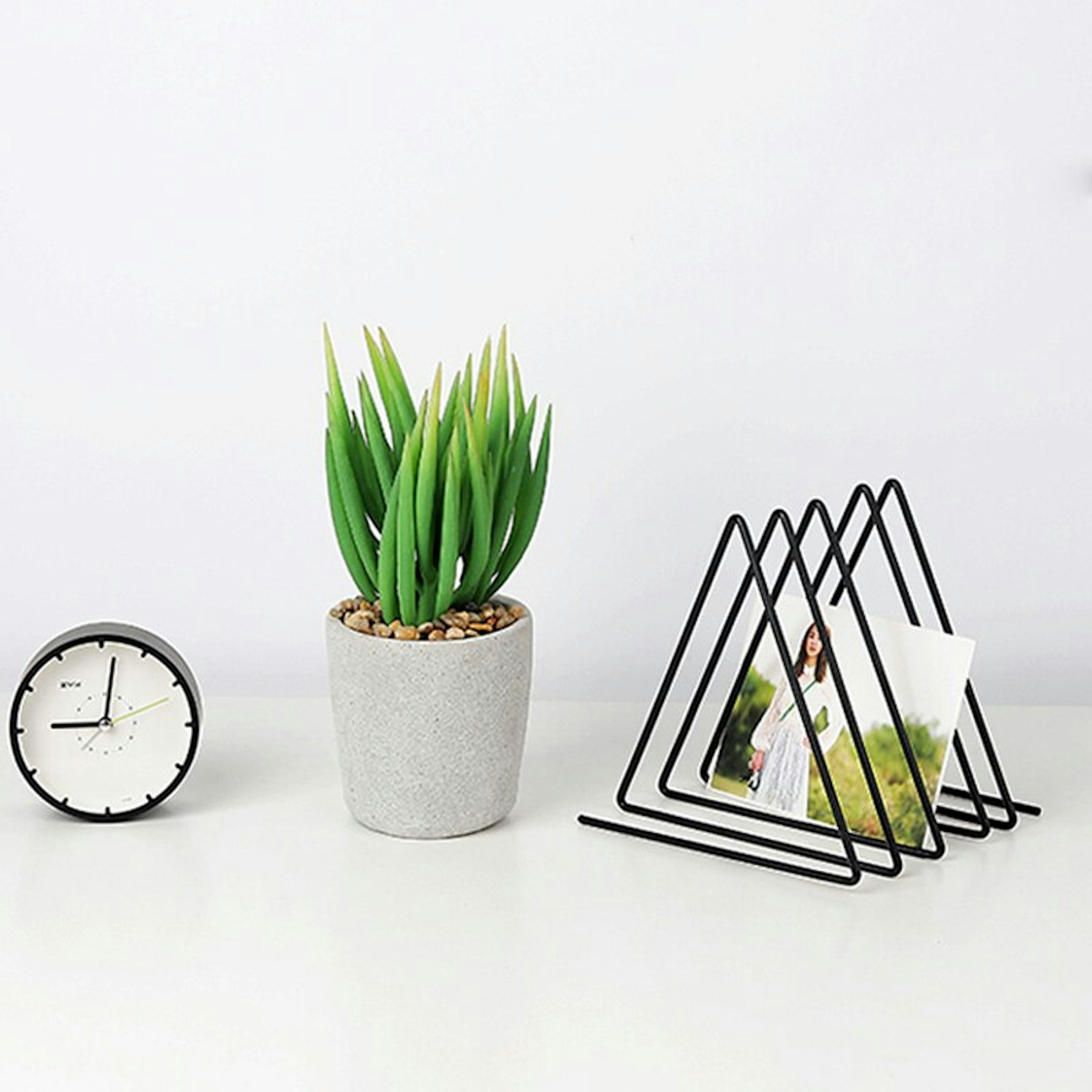 Triangle Magazine Rack - $1.4 on AliExpress, via Thieve • thieve.co