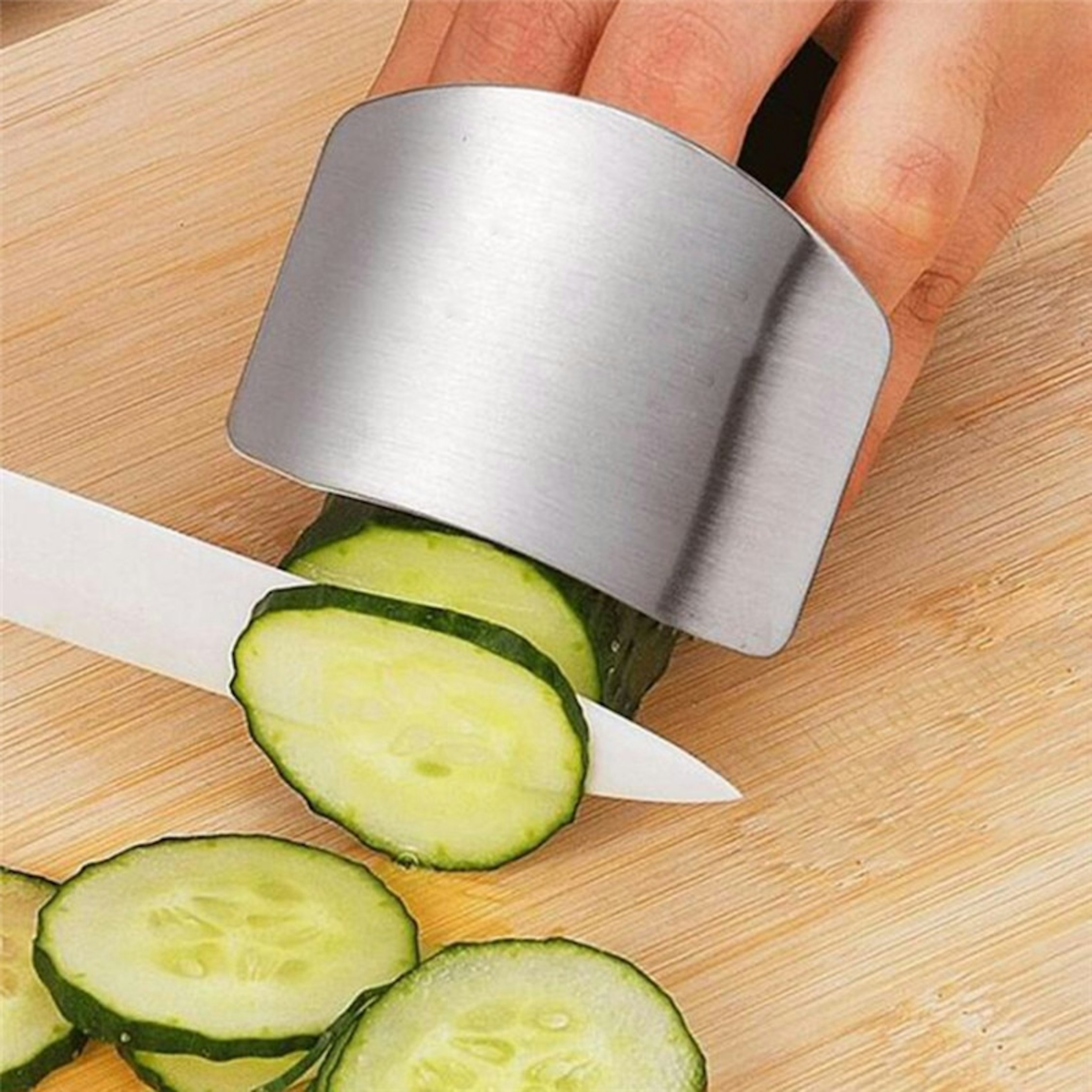 Knife Cutting Finger Guard - $0.25 on AliExpress, via Thieve • thieve.co
